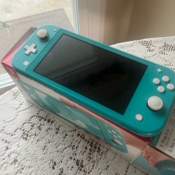 Video Games & Consoles | Nintendo Switch Lite Light Used Turquoise ...